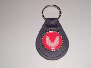 firebird or trans-am white bird logo leather keychain - purple