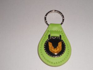 firebird or trans-am gold bird logo leather keychain - bright green