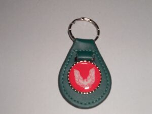 firebird or trans-am white bird logo leather keychain - teal