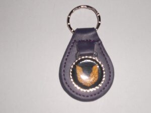 firebird or trans-am gold bird logo leather keychain - purple