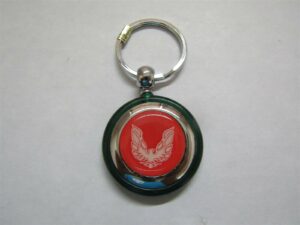 firebird or trans-am white bird logo round plastic keychain - green