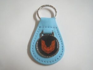 firebird or trans-am orange bird logo leather keychain - light blue