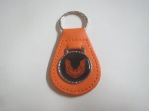 firebird or trans-am orange bird logo leather keychain - pumpkin