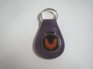 firebird or trans-am orange bird logo leather keychain - purple