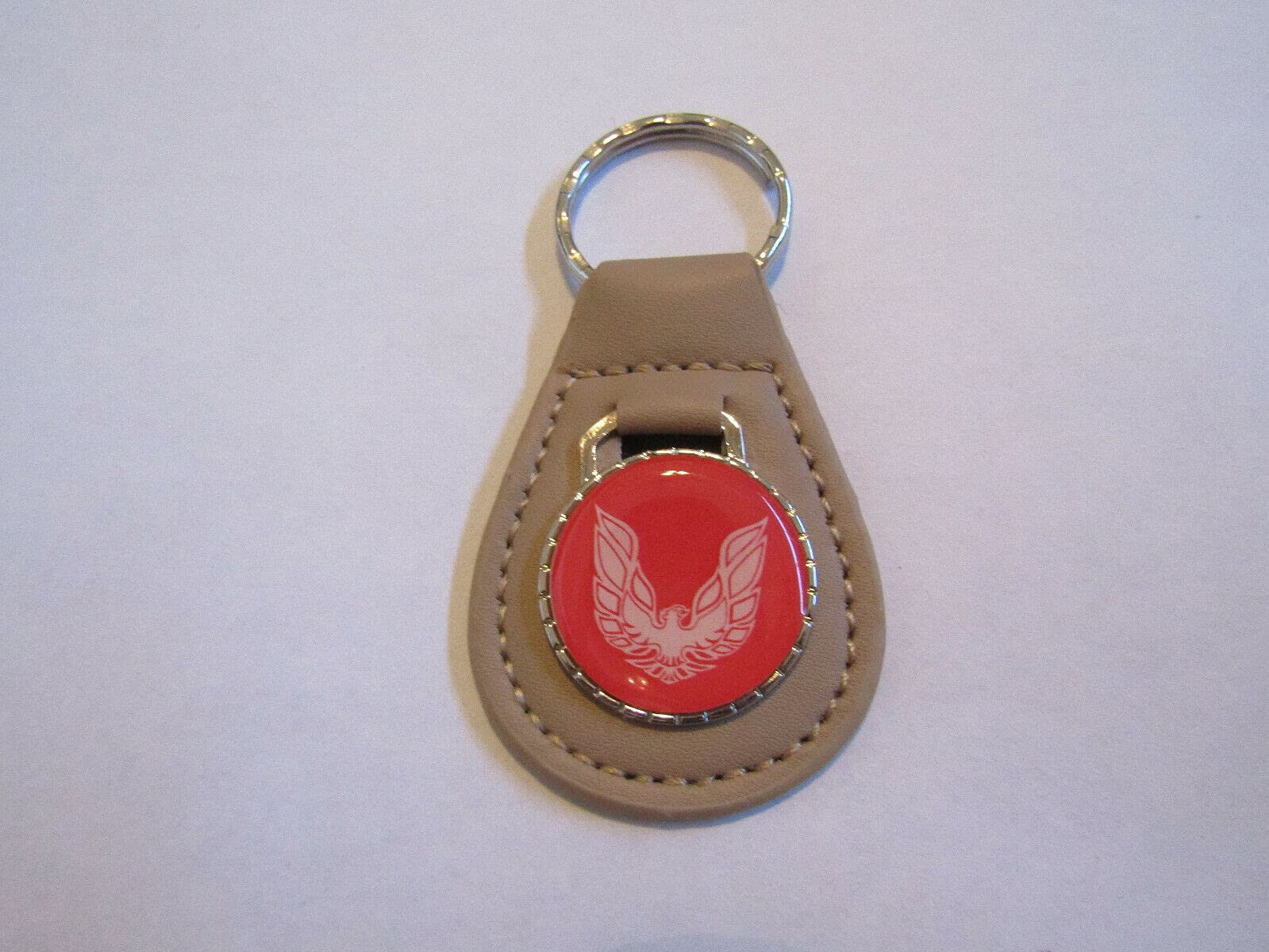 FIREBIRD OR TRANS-AM WHITE BIRD LOGO LEATHER KEYCHAIN - BEIGE