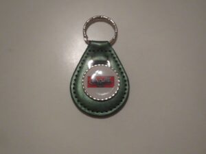 1962 1963 1964 galaxie 390 bird white red & gold logo leather keychain - teal