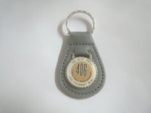 1962 1963 1964 galaxie 406 high performance engine logo leather keychain - grey