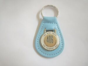 1962 1963 1964 galaxie 406 high performance engine logo leather keychain - light blue