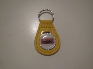 1962 1963 1964 galaxie 390 bird white red & gold logo leather keychain - yellow