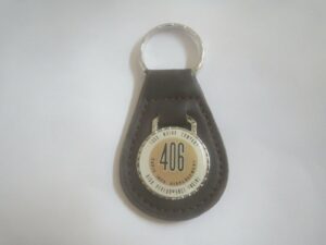 1962 1963 1964 galaxie 406 high performance engine logo leather keychain - mocha