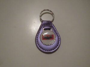 1962 1963 1964 galaxie 390 bird white red & gold logo leather keychain - purple