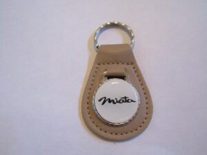 1990's 2000's miata vintage logo leather keychain - beige