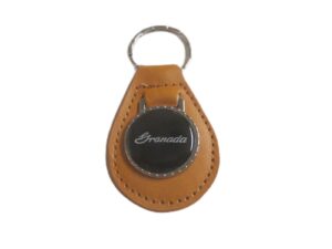 1975 1976 1977 1978 1979 1980 1981 1982 granada script logo leather keychain - orange