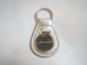 1975 1976 1977 1978 1979 1980 1981 1982 granada script logo leather keychain - silver