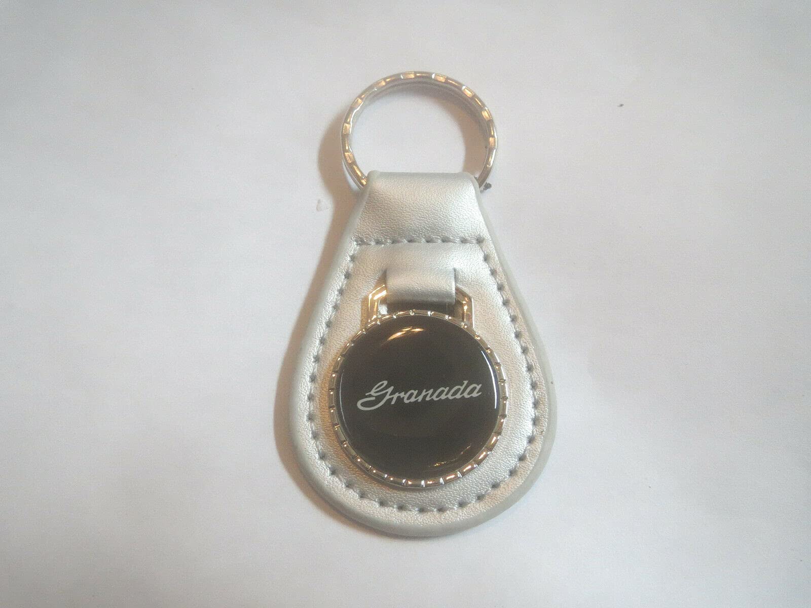 1975 1976 1977 1978 1979 1980 1981 1982 GRANADA SCRIPT LOGO LEATHER KEYCHAIN - SILVER