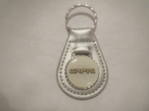 1980's 1990's capri lettering emblem logo leather keychain - silver