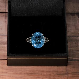 KOKAV 14K White Gold Genuine Blue Topaz 5-5/8 Ct Oval, Diamond Accent Ring, Split Shank. Size 7