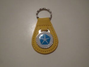 newport new yorker 300 lebaron lhs laser white logo leather keychain - yellow