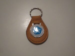 newport new yorker 300 lebaron lhs laser white logo leather keychain - orange