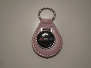 amx a-m-x emblem logo leather keychain - pink