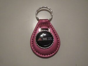 amx a-m-x emblem logo leather keychain - magenta