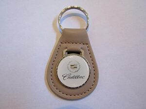 eldorado seville deville fleetwood calais allante logo leather keychain - beige