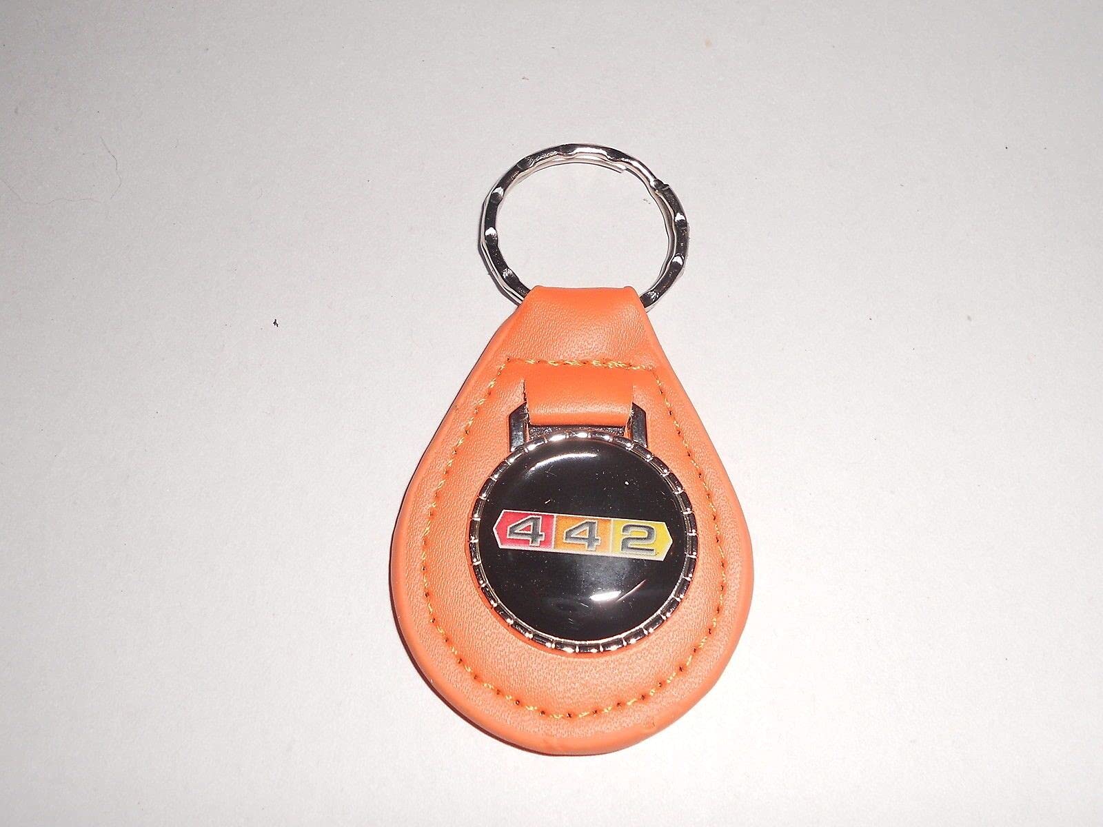 1965 1966 1967 1968 OLDS 442 4-4-2 TRI COLOR LOGO LEATHER KEYCHAIN - PUMPKIN