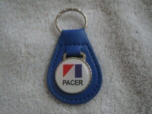 1975 1976 1977 1978 1979 amc pacer logo emblem leather keychain - dark blue