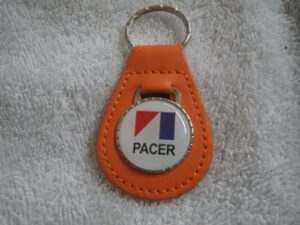 1975 1976 1977 1978 1979 amc pacer logo emblem leather keychain - pumpkin