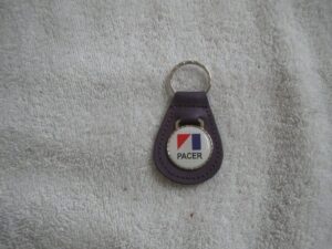 1975 1976 1977 1978 1979 amc pacer logo emblem leather keychain - purple