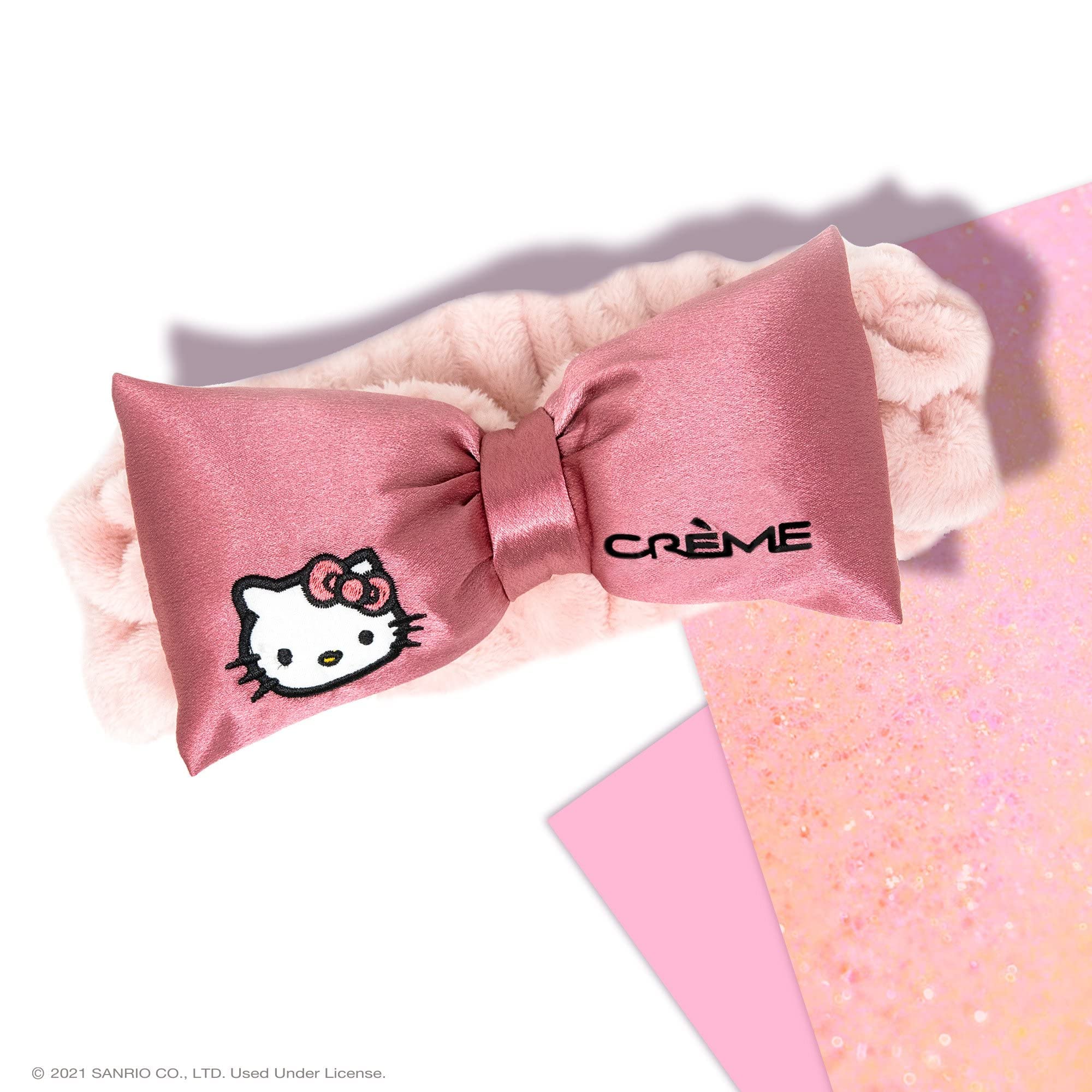 The Crème Shop x Sanrio Hello Kitty Pink Satin Plush Spa Headband Cruelty-Free Vegan Elegant Functional for Skincare Makeup Routines Elevate Your Beauty Regimen with Luxury Charm.