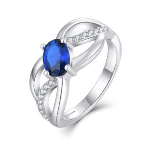 jo wisdom 925 sterling silver women's criss cross statement rings for women with 5x7mm blue sapphire oval birthstone size 9