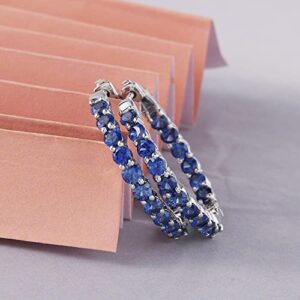 Femme Luxe created blue sapphire gemstone Inside-Out hoop earrings in silver, September birthstone.