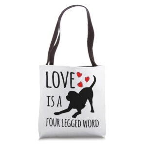 funny dog mom dog dad black lab "love is a four-legged word" tote bag