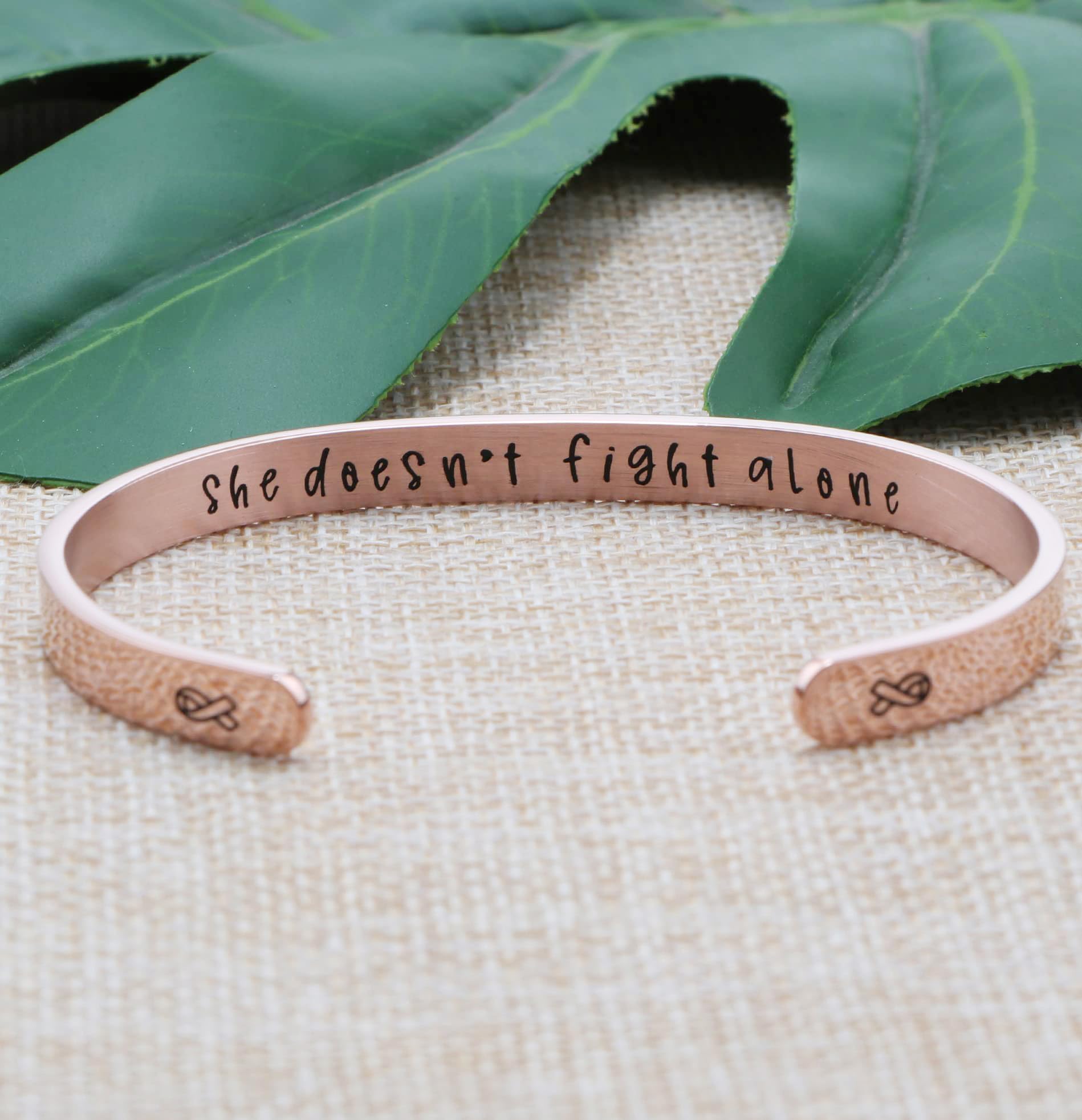 JoycuFF Cancer Survivor Gifts for Women Breast Cancer Awareness Bracelets 18K Rose Gold Cuff Bangle Inspirational Cancer Jewelry Saying She Doesnt Fight Alone