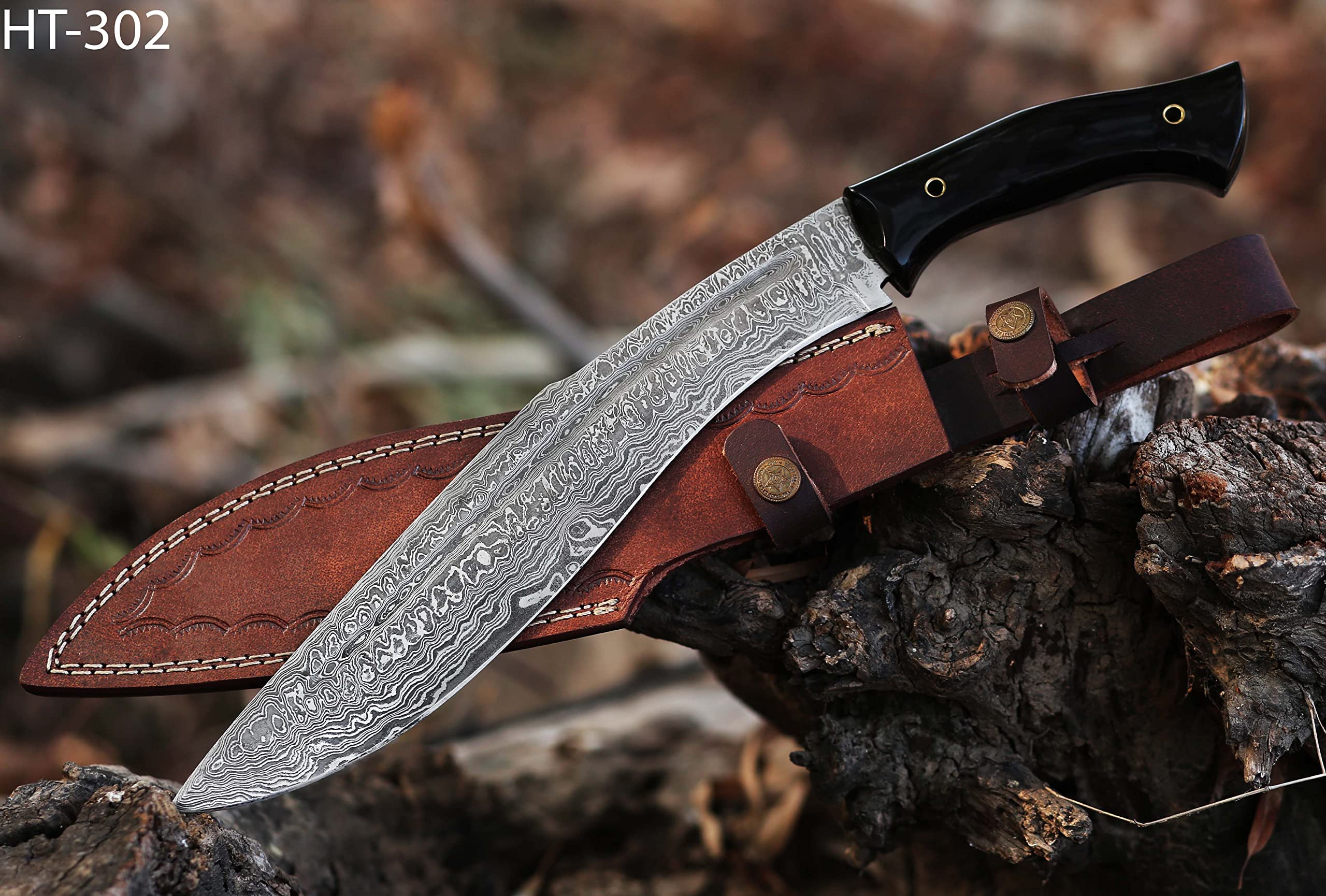 12.5 Inch long Hunting knife, Collectible knife, Natural Camel bone scale embellished with engraved brass finger guard, foil work spacer and pommel, Hand forged Twist pattern Damascus steel blade, Comes with Leather sheath