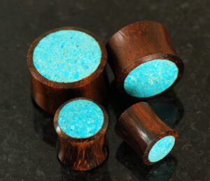 pair crushed turquoise stone set in organic wood saddle ear plugs - 0g