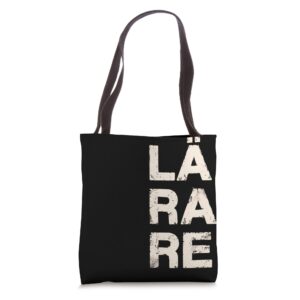 teacher written in swedish language tote bag