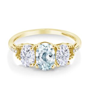 Gem Stone King 10K Yellow Gold Sky Blue Aquamarine White Moissanite and Diamond Accent 3-Stone Women Engagement Ring (1.77 Cttw, Available In Size 5, 6, 7, 8, 9)