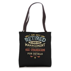 im not retired im under new management see grandkids details tote bag