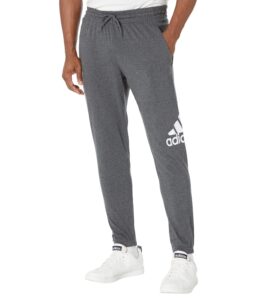 adidas men's essentials single jersey tapered badge of sport pants, dark grey heather, x-large