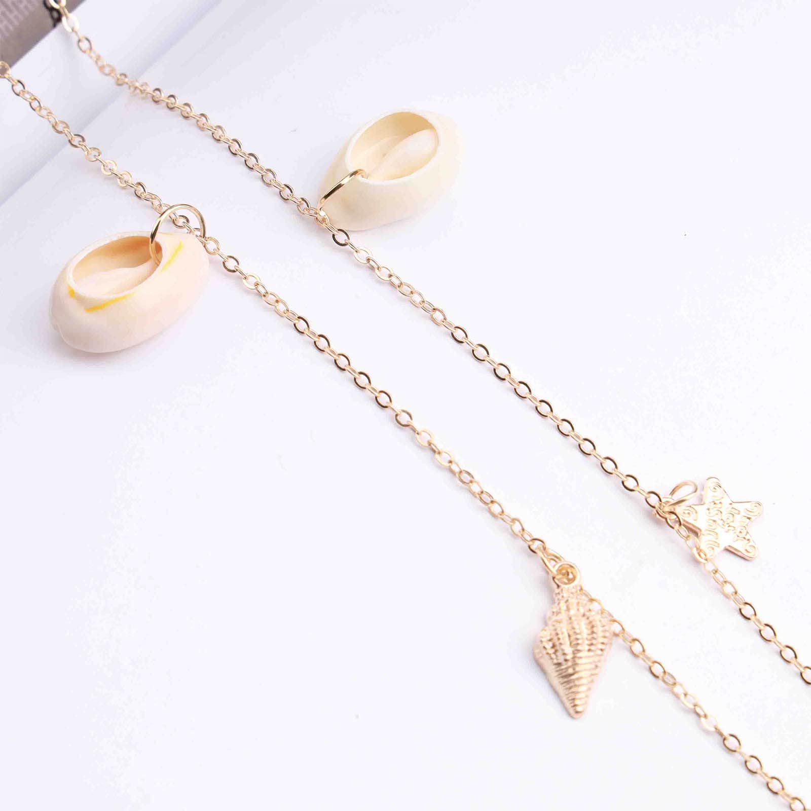 YienDoo Sexy Seashell Waist Chain Boho Star Shell Conch Pendant Body Chain Bikini Chain Belly Chain Belt Chain Stomach Chain Fashion Gold Body Jewelry Chain Gifts for Women and Girls