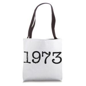 1973 old typewriter black color font text vintage tote bag