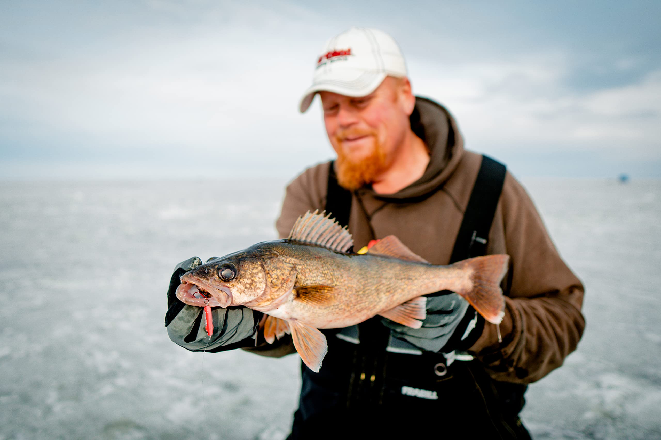 Northland Fishing Tackle Glass Buck-Shot Ice Fishing Jigging Spoon, Glo White, 3/32 Oz for Walleye, Perch, and Crappie