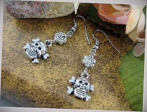 pair tibetan silver delicate carved skull beaded amulet earrings