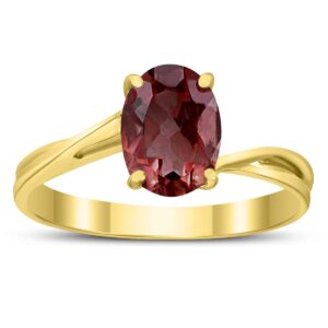 solitaire oval 8x6mm garnet gemstone twist ring in 10k yellow gold