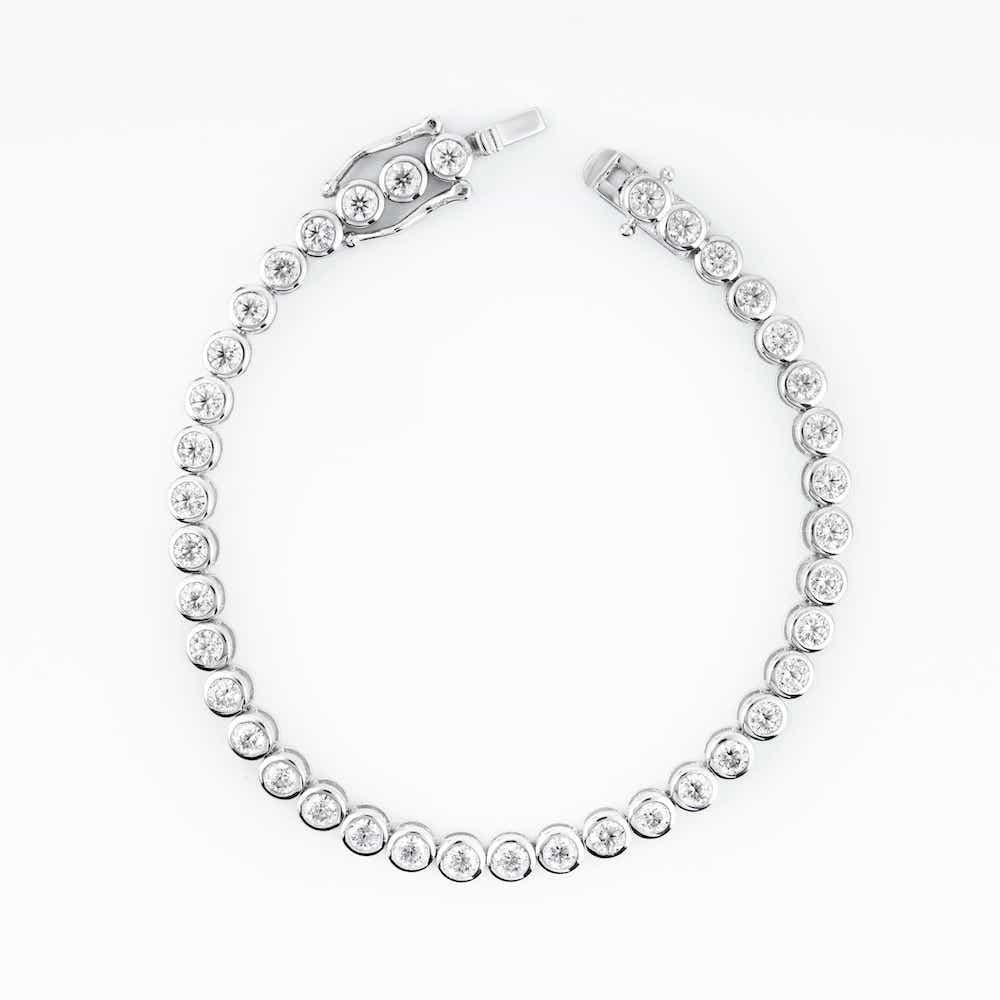 TwoBirch Sterling Silver and Moissanite Bezel Set Tennis Bracelet (3MM)(8 Inches)