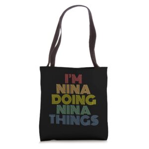 i'm nina doing nina things personalized name tote bag