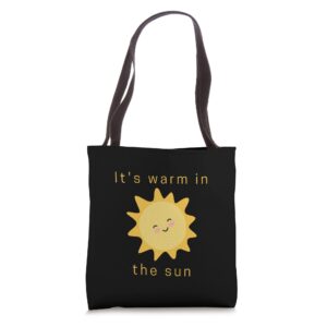 it's warm in the sun tote bag