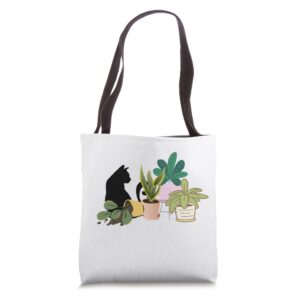 black cat plays in the plants naughty kitty plant lover tote bag